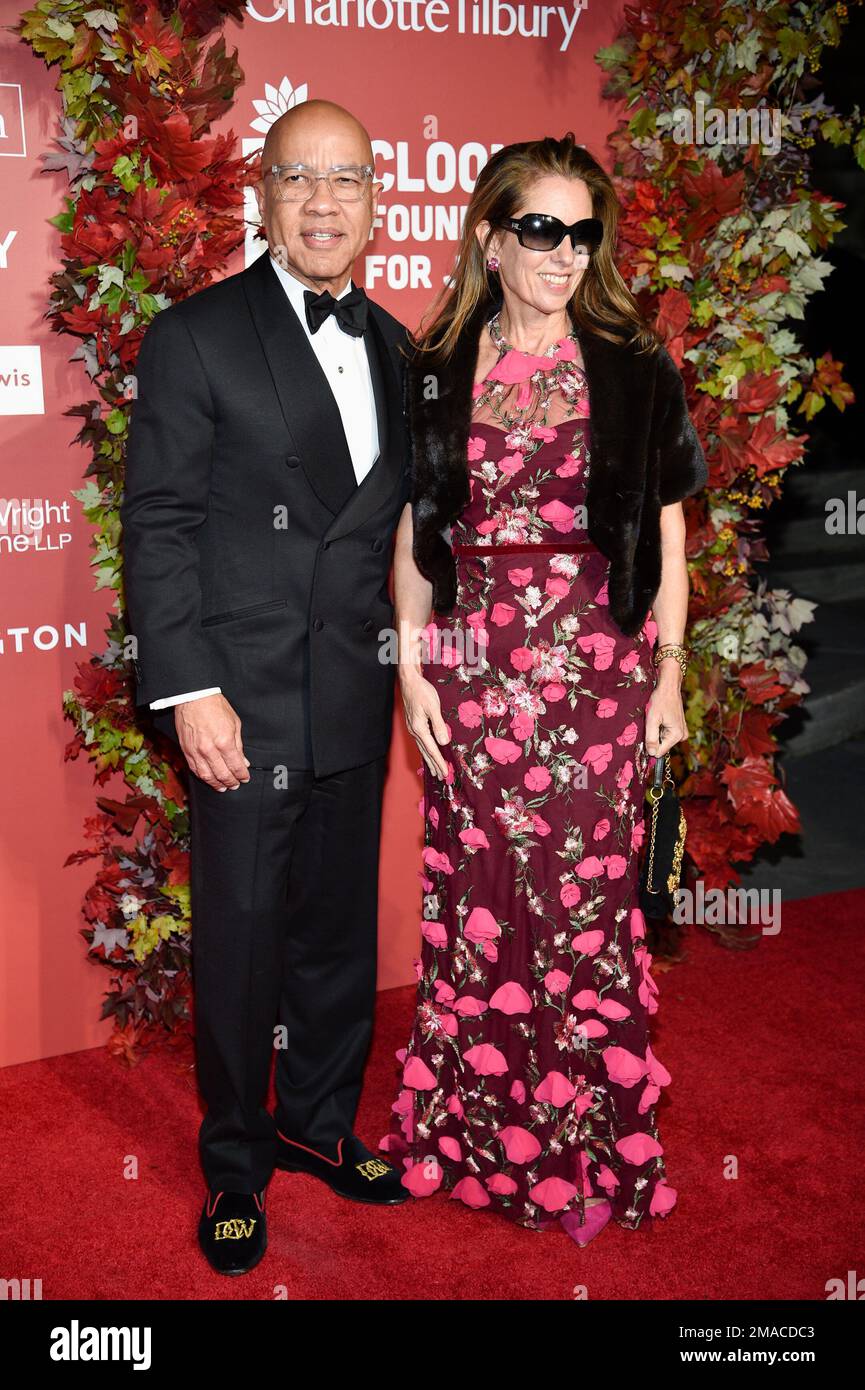 Ford Foundation president Darren Walker, left, and guest attend the ...
