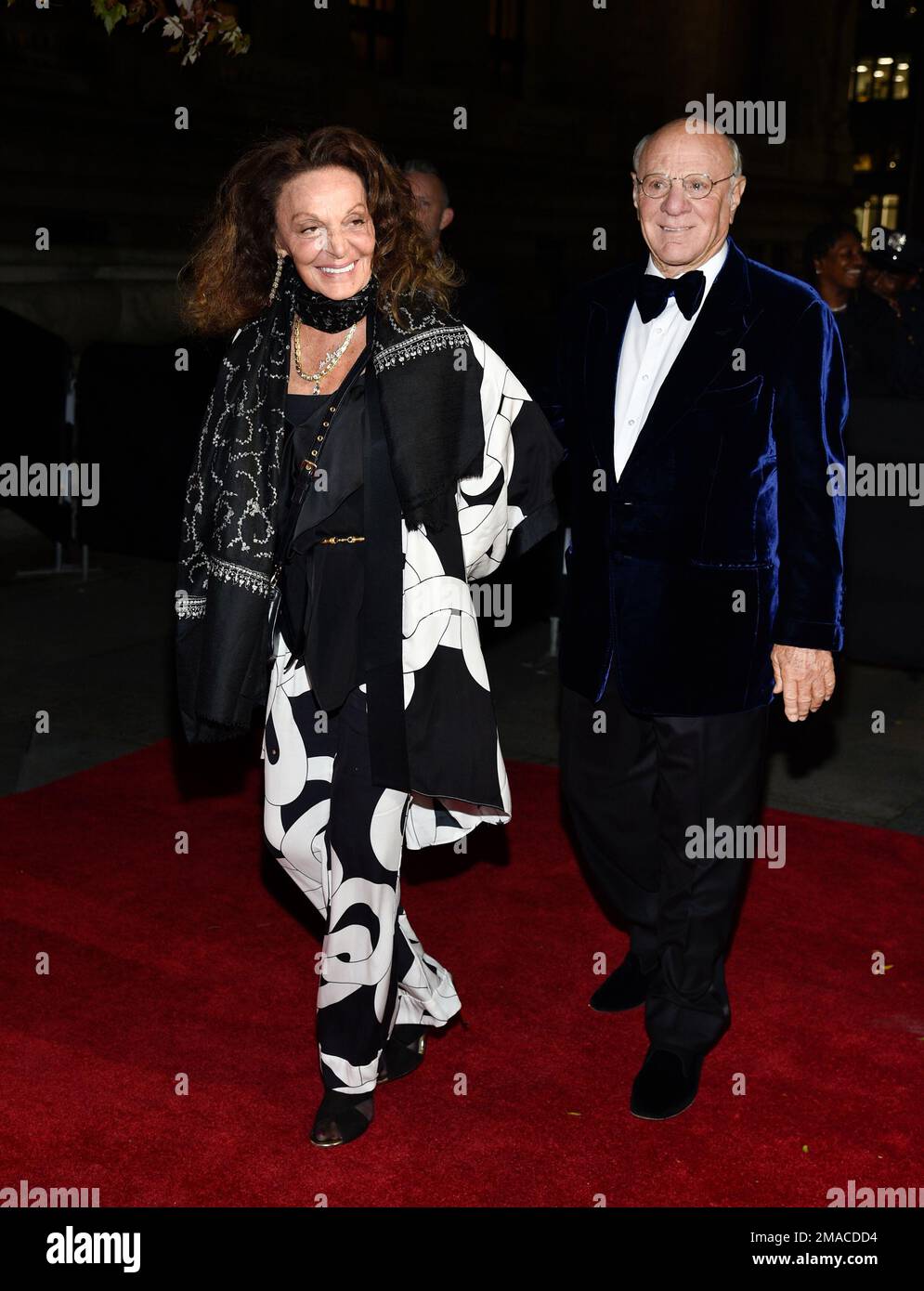 Diane von Furstenberg, left, and Barry Diller attend the Clooney ...