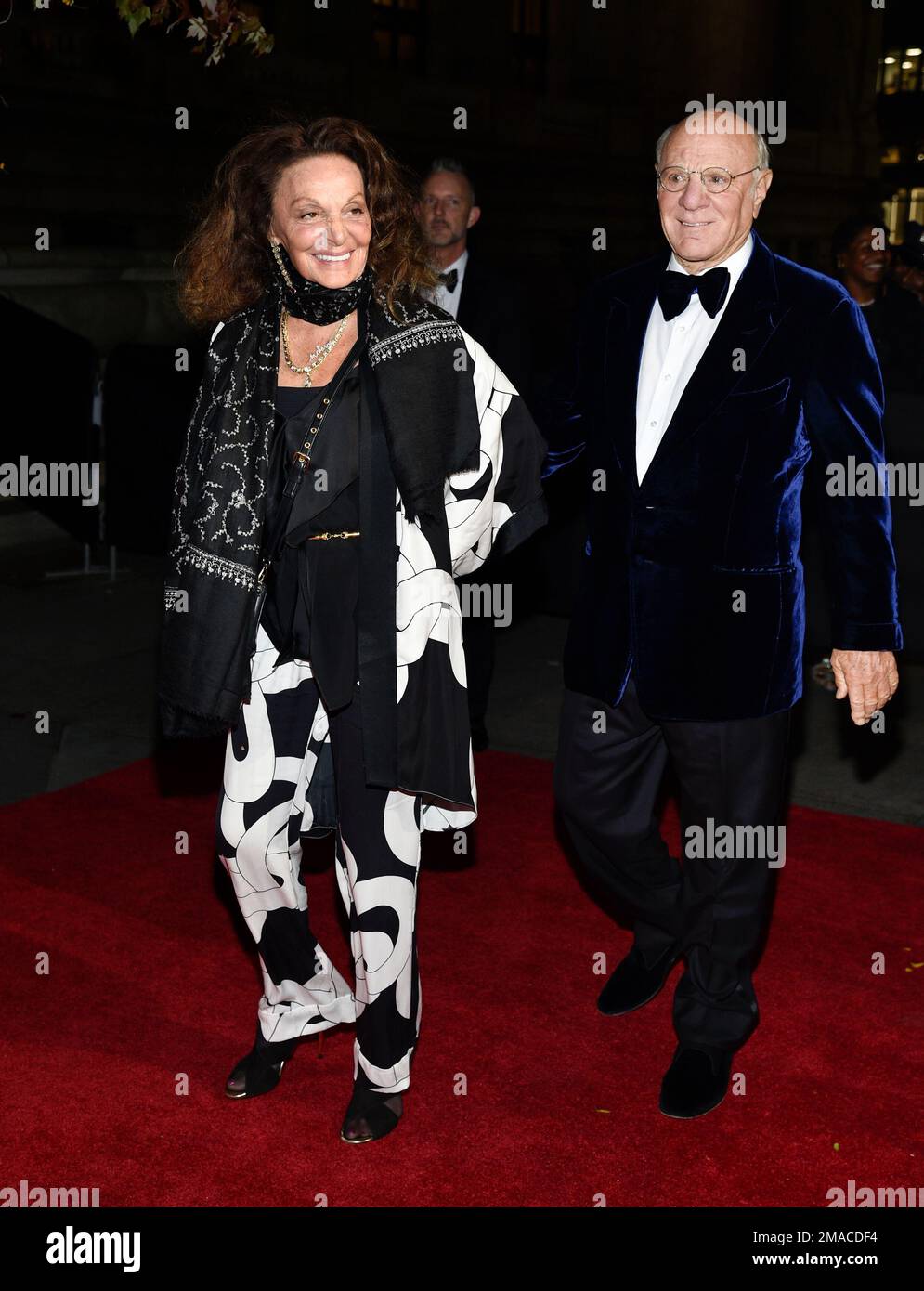 Diane von Furstenberg, left, and Barry Diller attend the Clooney ...