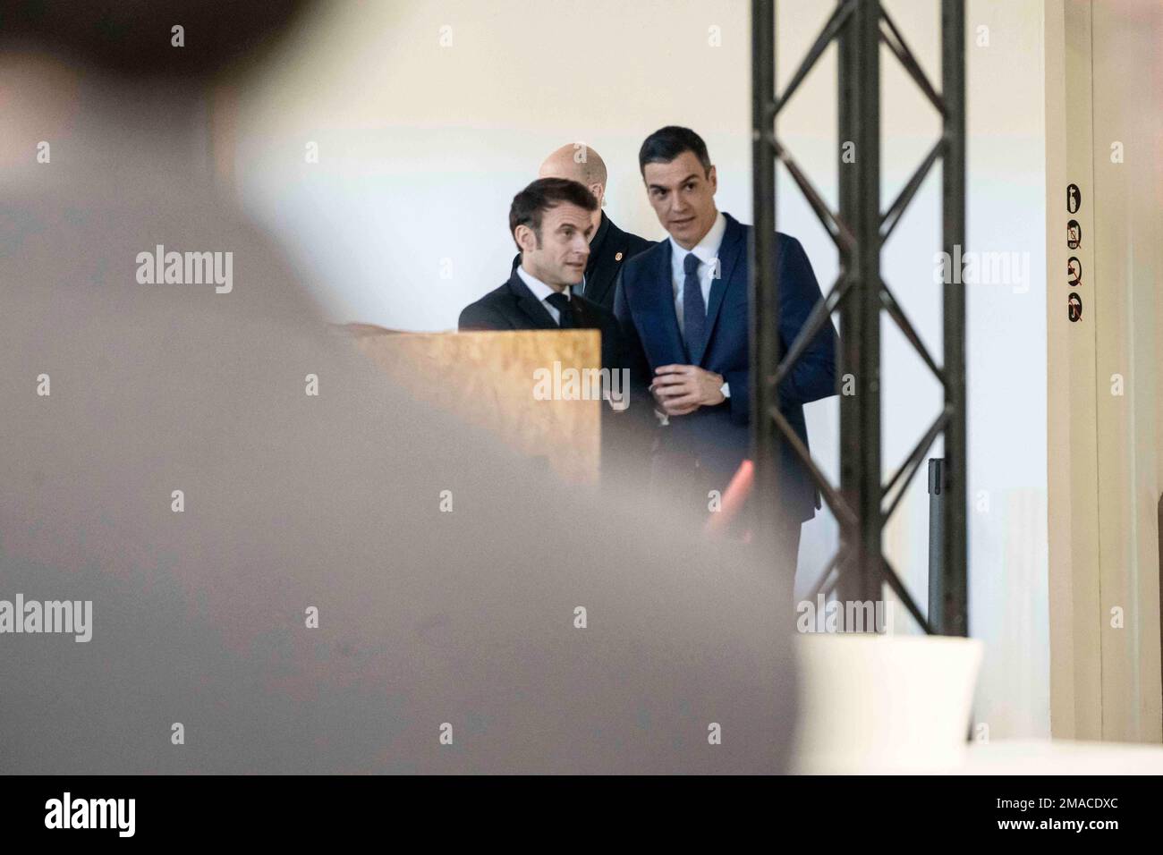 French President Emmanuel Macron speaks with Spain's Prime Minister ...