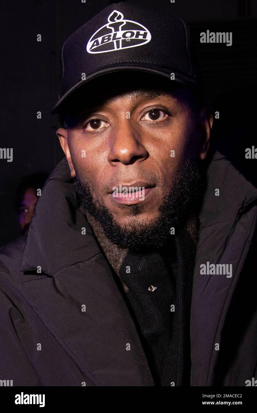 Mos Def arrives for the Off-White ready-to-wear Spring/Summer 2023 ...