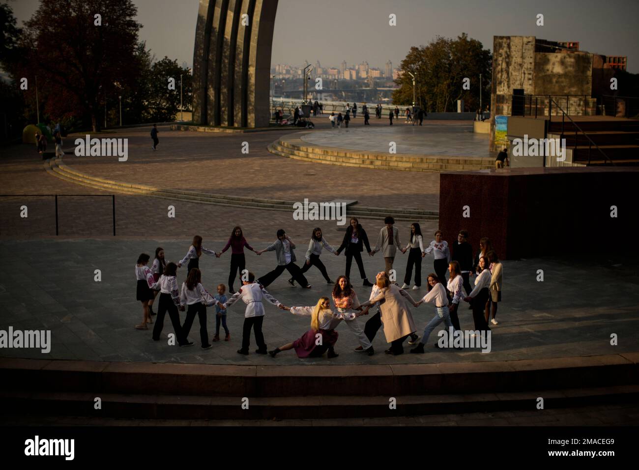 Youngsters play a group game at the Arch of Freedom of the Ukrainian ...