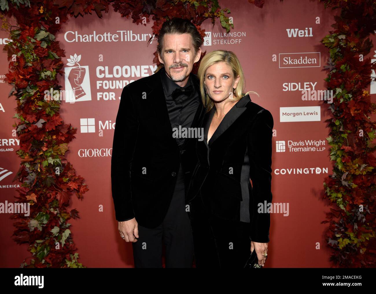 Ethan Hawke, left, and wife Ryan Hawke attend the Clooney Foundation ...