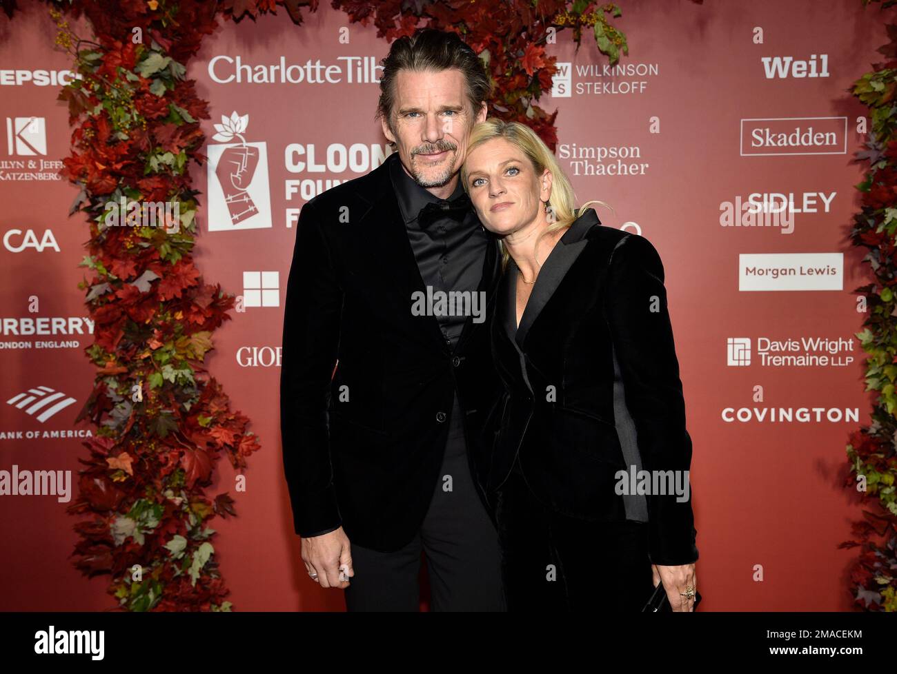 Ethan Hawke, left, and wife Ryan Hawke attend the Clooney Foundation ...