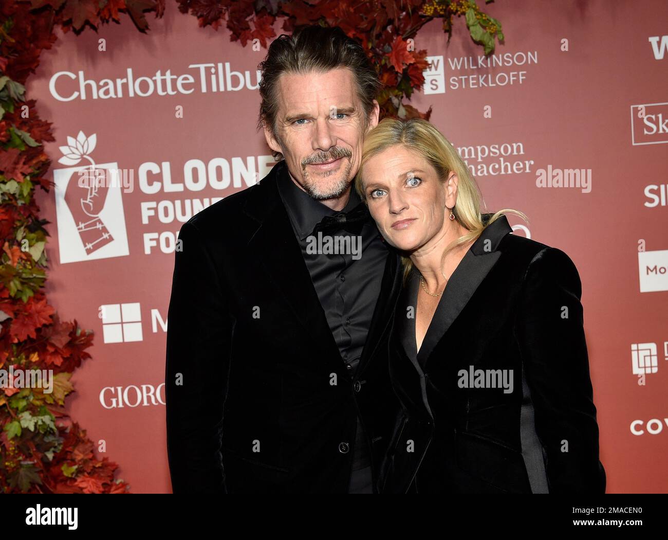 Ethan Hawke, left, and wife Ryan Hawke attend the Clooney Foundation ...