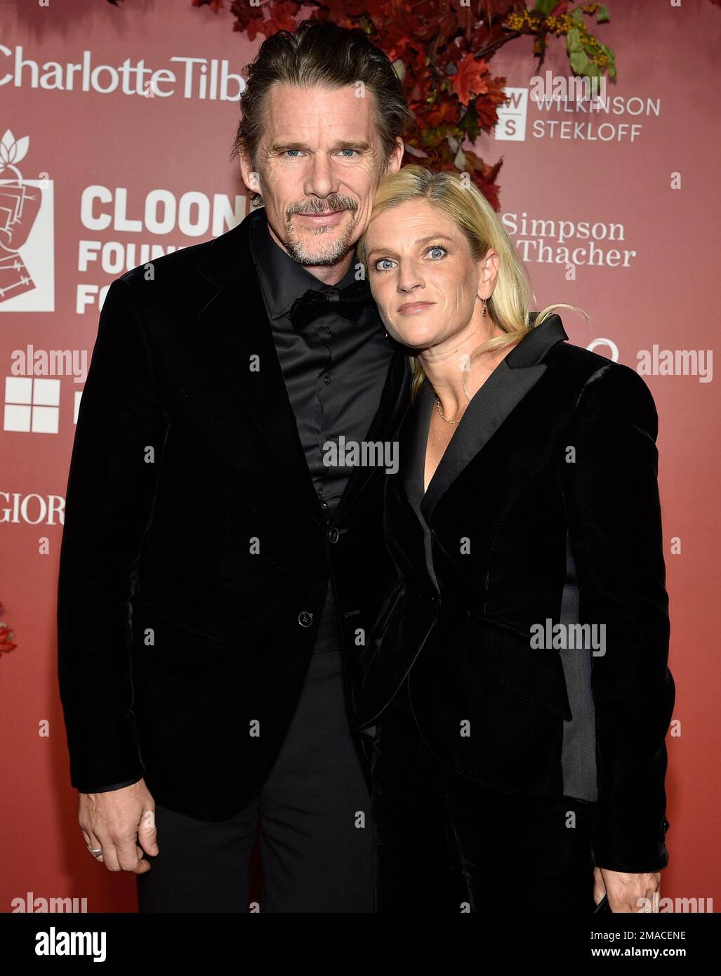 Ethan Hawke, left, and wife Ryan Hawke attend the Clooney Foundation ...