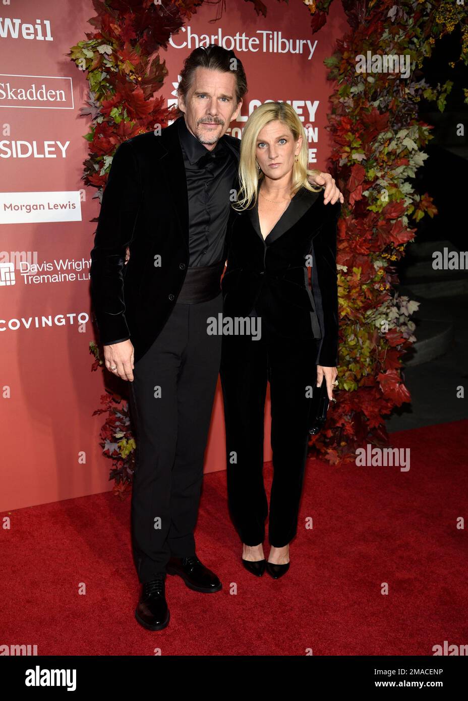 Ethan Hawke, left, and wife Ryan Hawke attend the Clooney Foundation ...