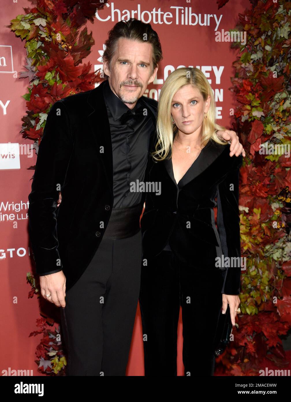 Ethan Hawke, left, and wife Ryan Hawke attend the Clooney Foundation ...