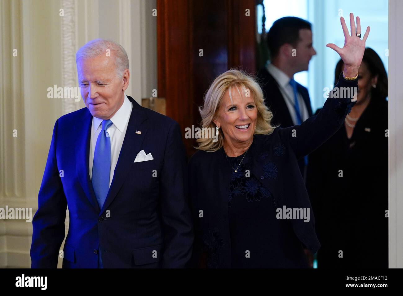 First lady Jill Biden waves as she arrives with President Joe Biden for ...