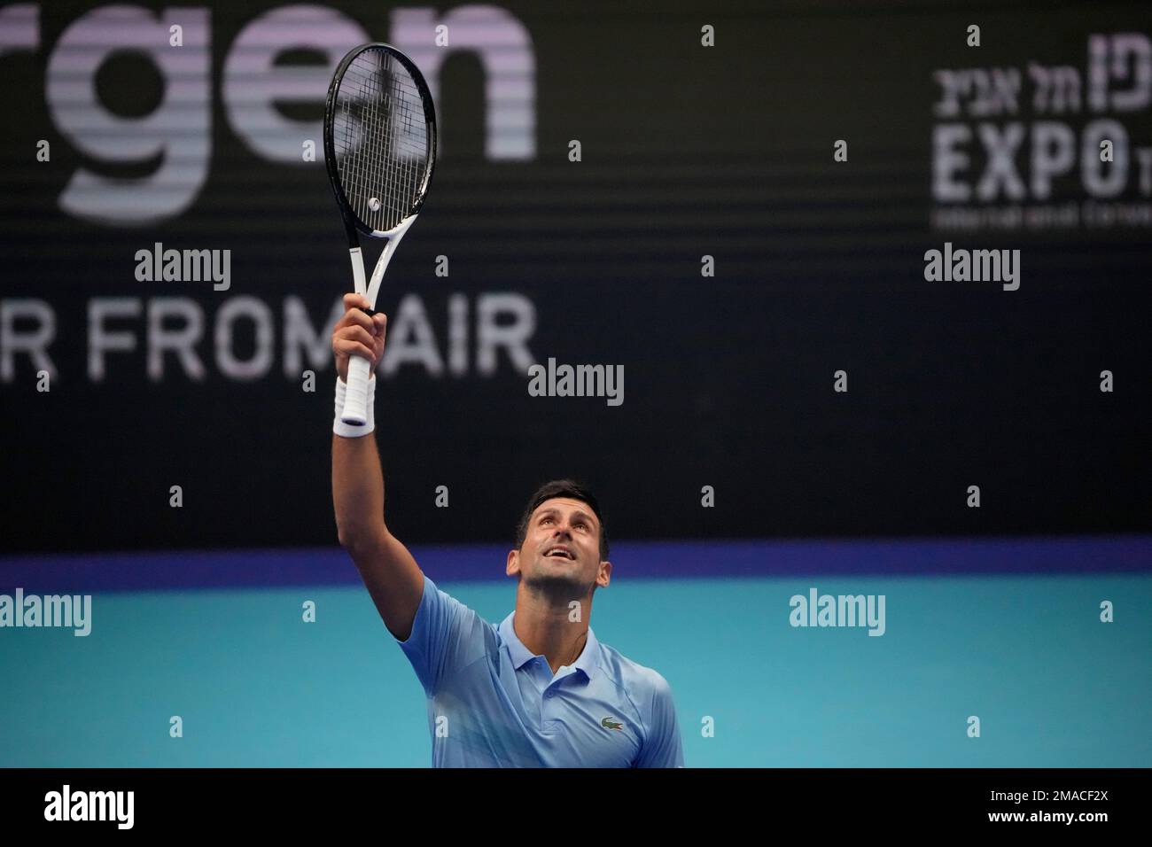 Serbia's Novak Djokovic returns to Canada's Vasek Pospisil during the quarterfinals of the ATP ...