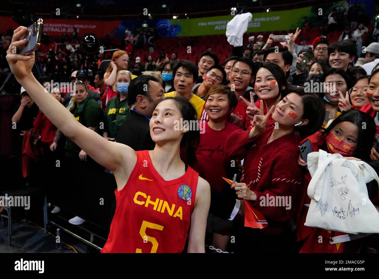 China's Wang Siyu takes a selfie with fans following her team's win ...