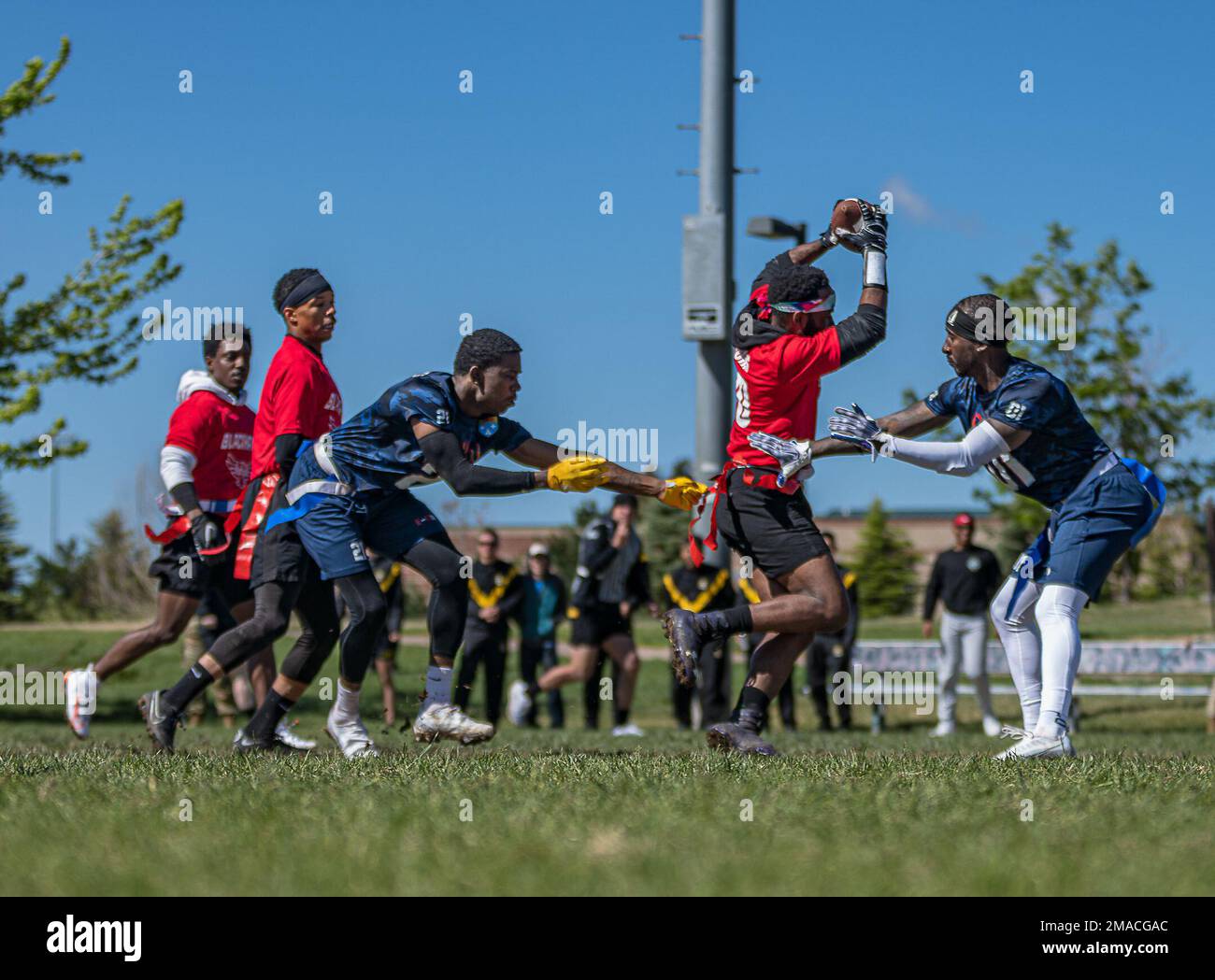 4th Infantry Division Soldiers on the blue team pull the flag from the ...