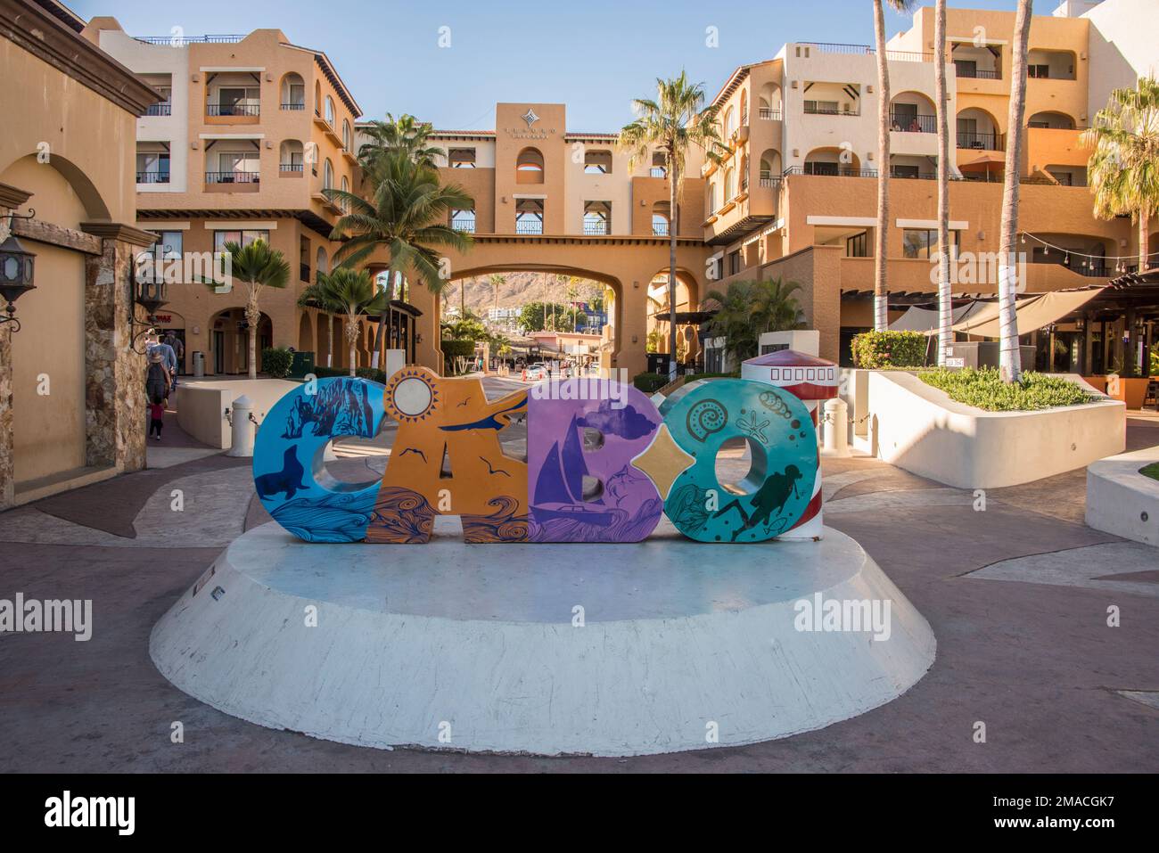 This colorful concrete sign is popular with tourists. Everyone has to ...