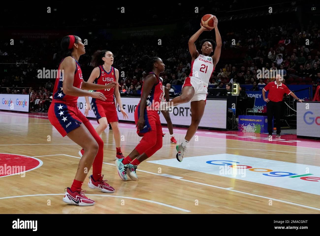 Canada's Nirra Fields takes a shot at goal as United States defenders ...