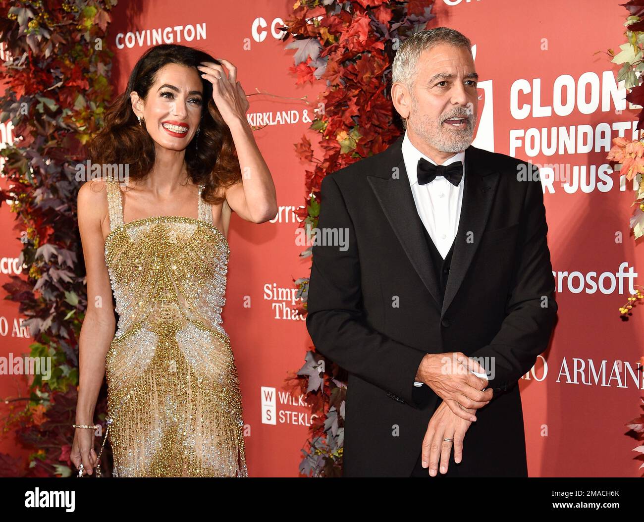 Amal Clooney, left, and George Clooney attend the Clooney Foundation ...