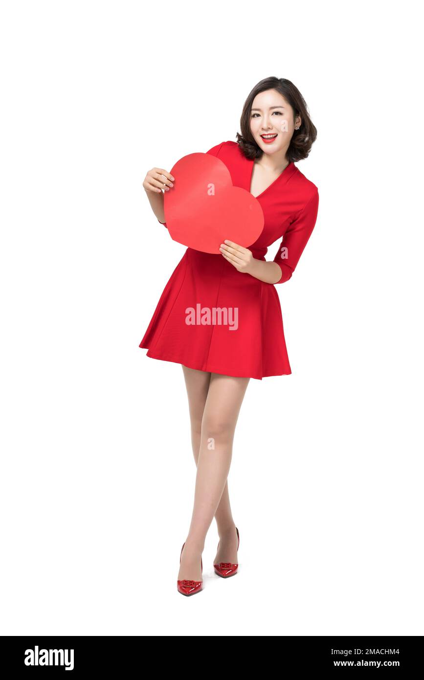 A young woman wearing a red dress Stock Photo - Alamy
