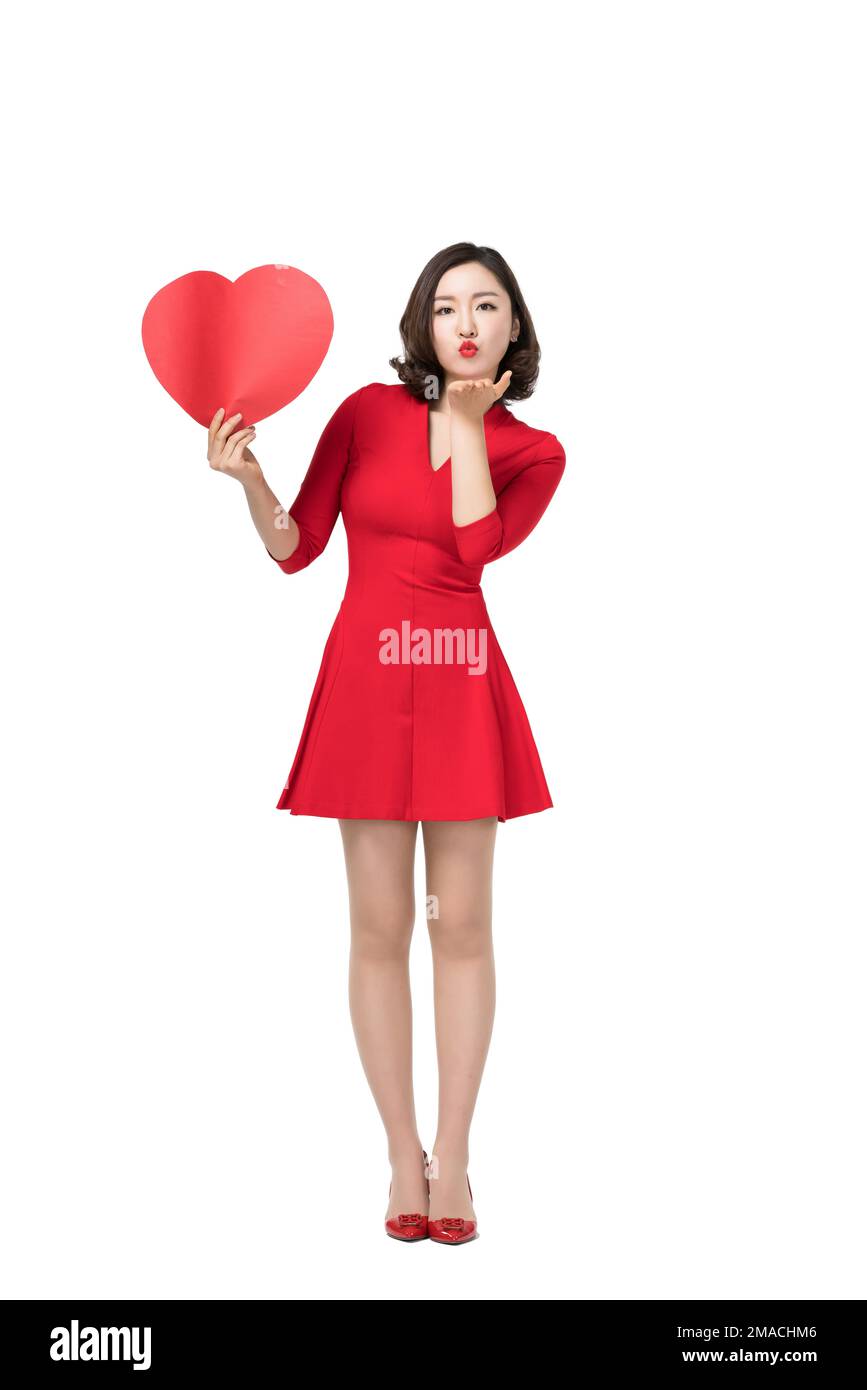 A young woman wearing a red dress Stock Photo - Alamy
