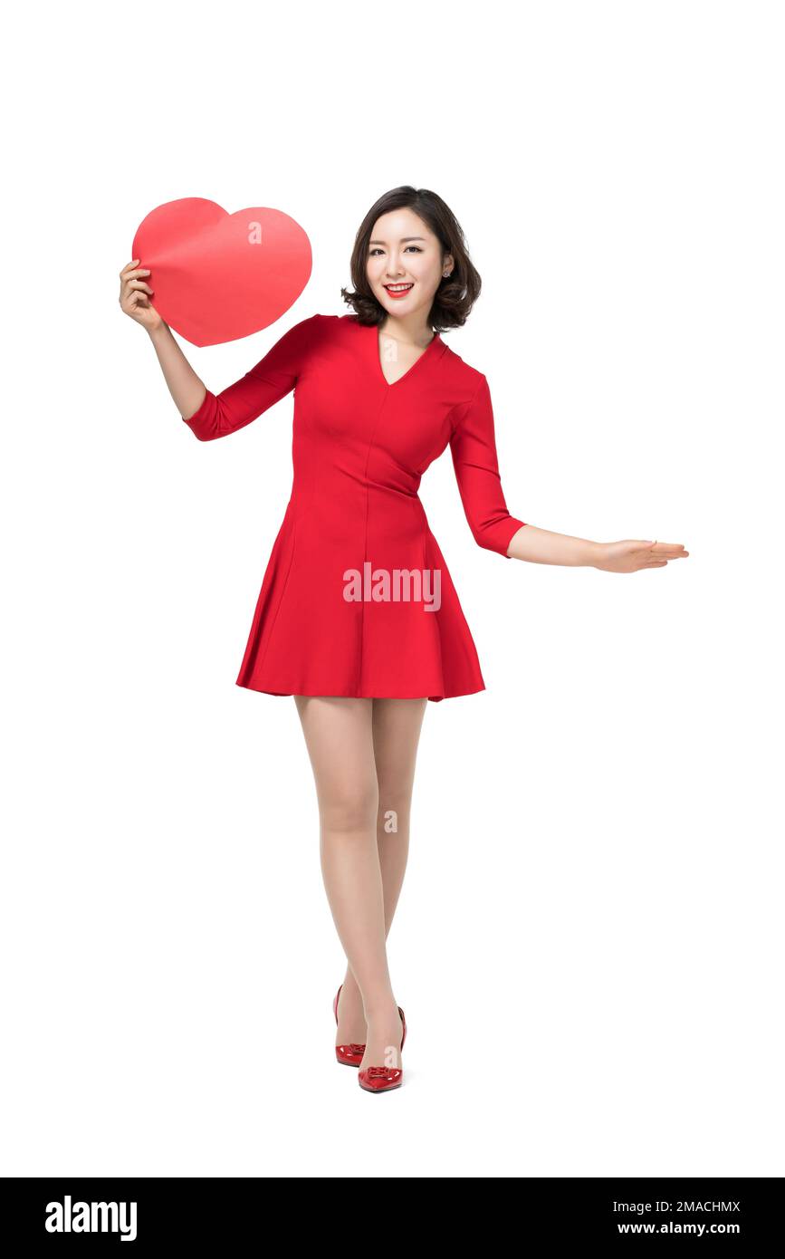A young woman wearing a red dress Stock Photo - Alamy