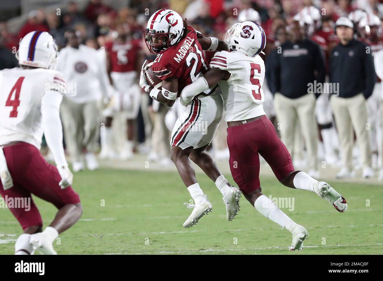 South Carolina running back Juju McDowell (21) can't spin away from ...