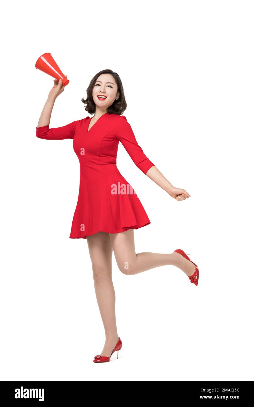 A young woman wearing a red dress Stock Photo - Alamy