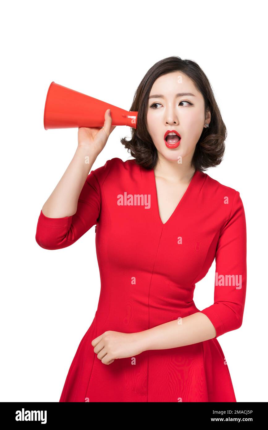 A young woman wearing a red dress Stock Photo - Alamy