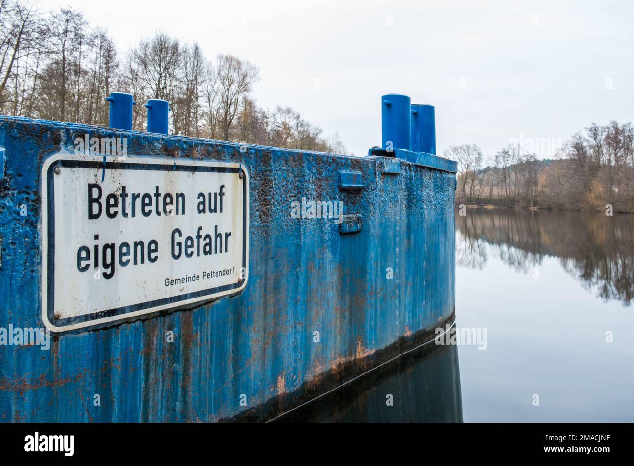 The blue iron system on the water with a caution sign in German ...