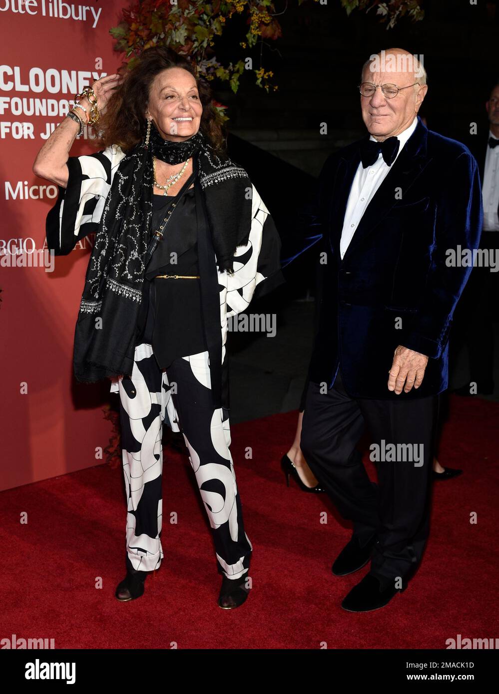 Diane von Furstenberg, left, and Barry Diller attend the Clooney ...