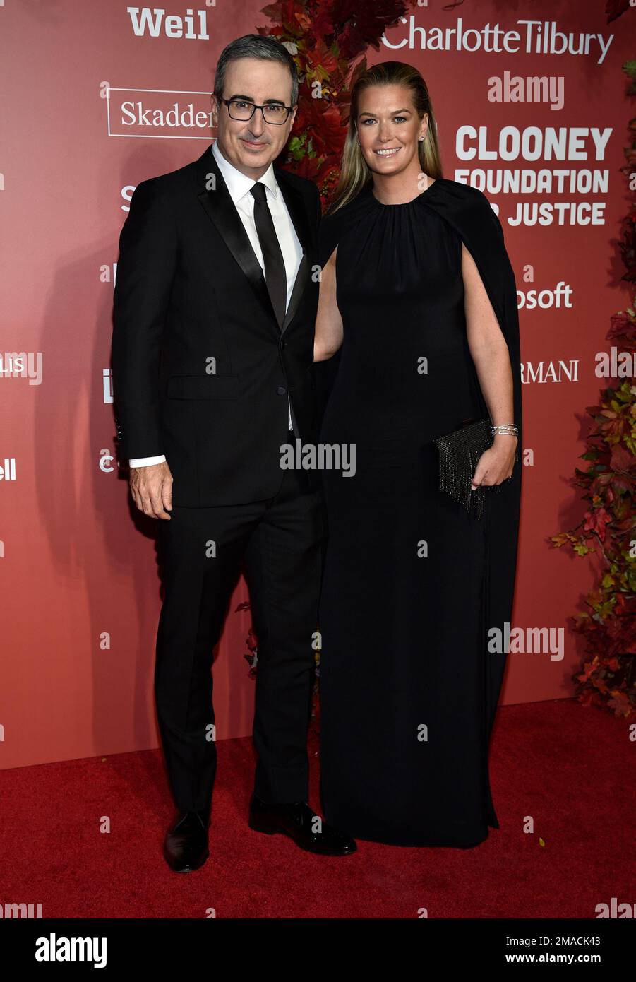 John Oliver, left, and Kate Norley attend the Clooney Foundation for ...