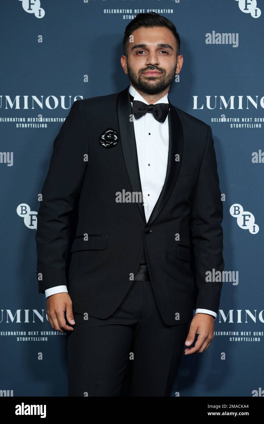 Erfan Saadati poses for photographers on arrival at the 'BFI Luminous ...