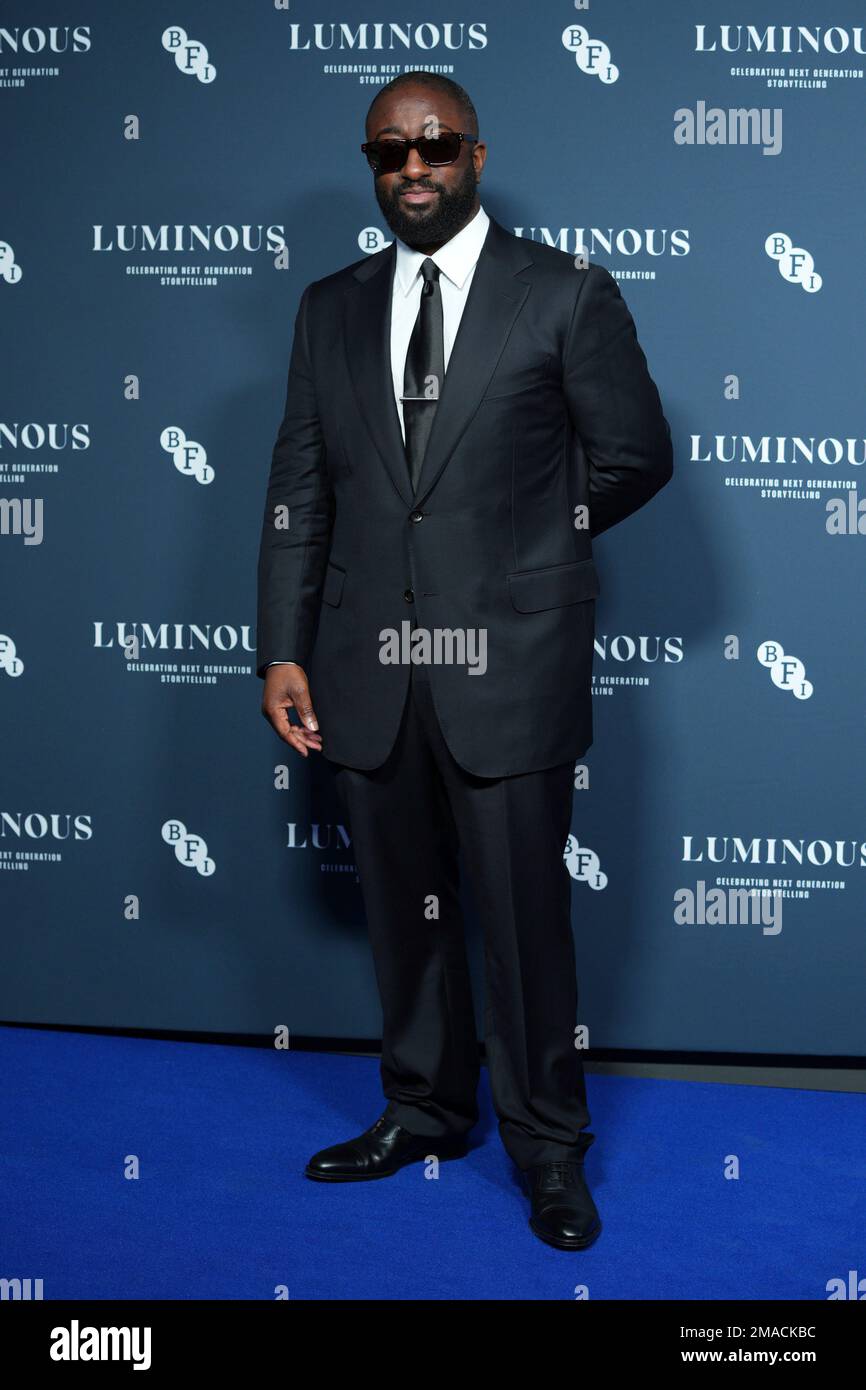 Baff Akoto poses for photographers on arrival at the 'BFI Luminous ...