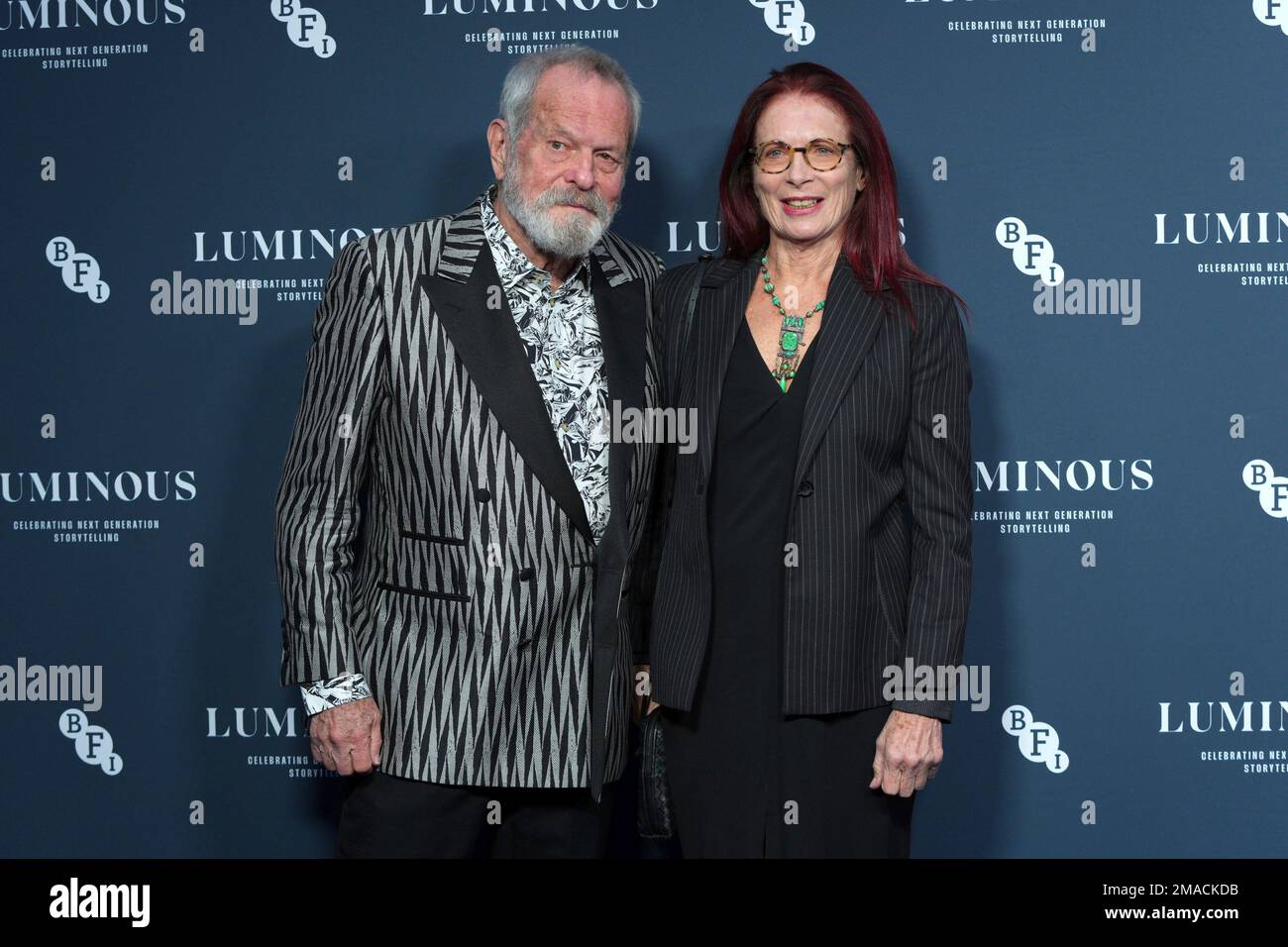 Terry Gilliam, left, and Maggie Weston pose for photographers on ...