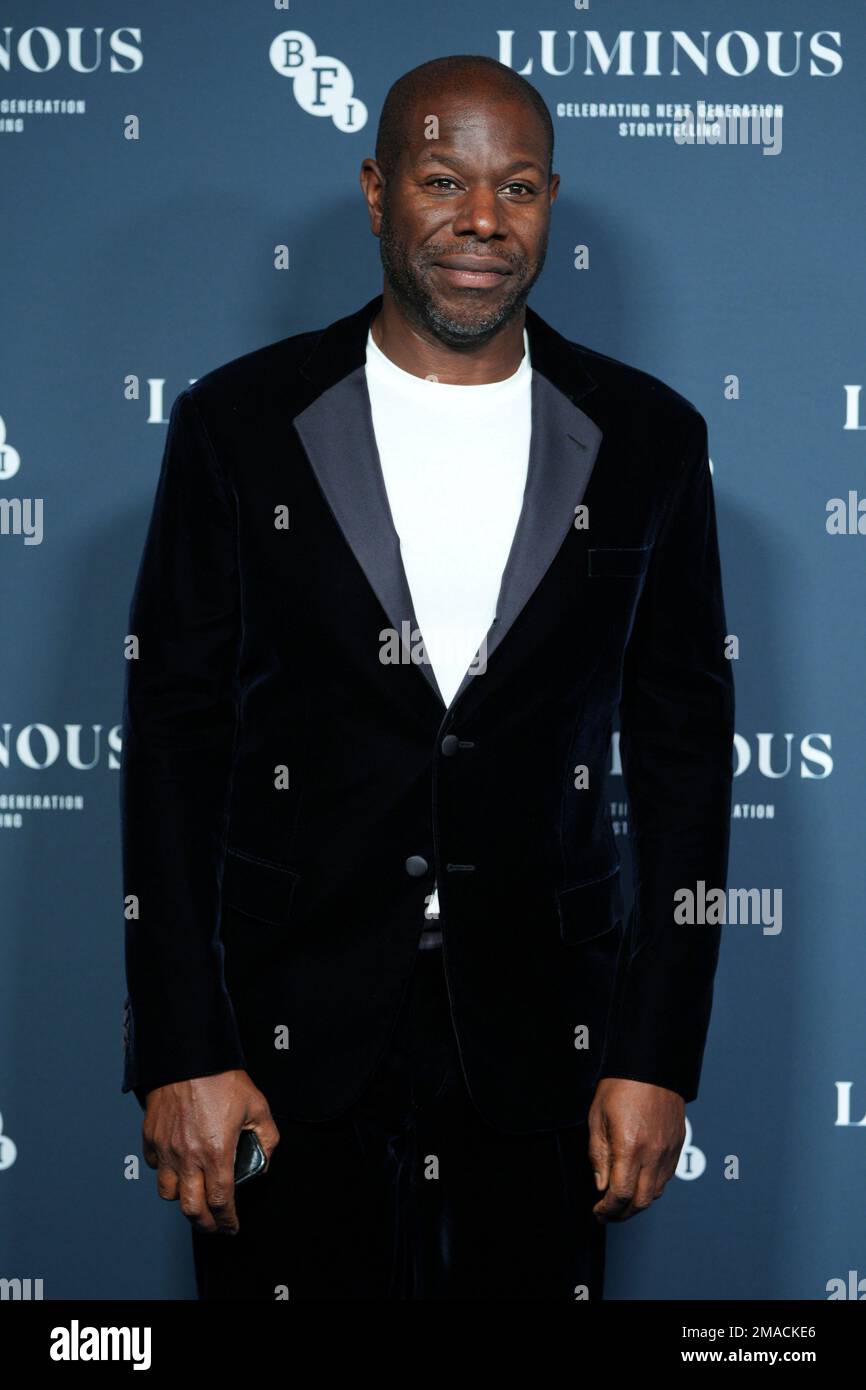 Steve McQueen poses for photographers on arrival at the 'BFI Luminous ...