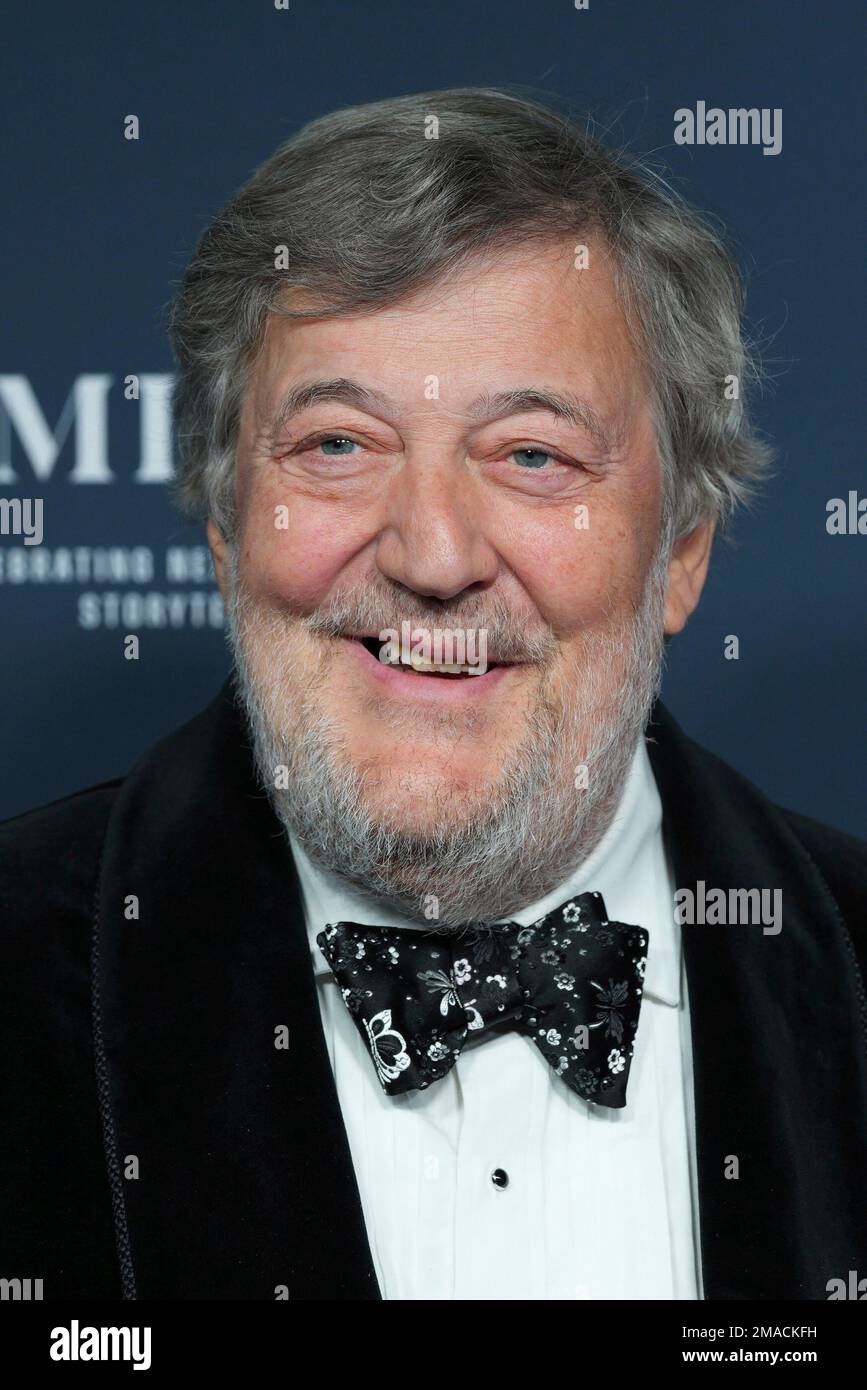 Stephen Fry poses for photographers on arrival at the 'BFI Luminous ...
