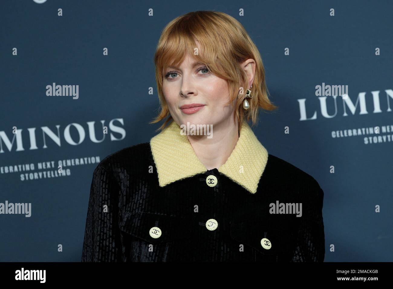 Emily Beecham poses for photographers on arrival at the 'BFI Luminous ...