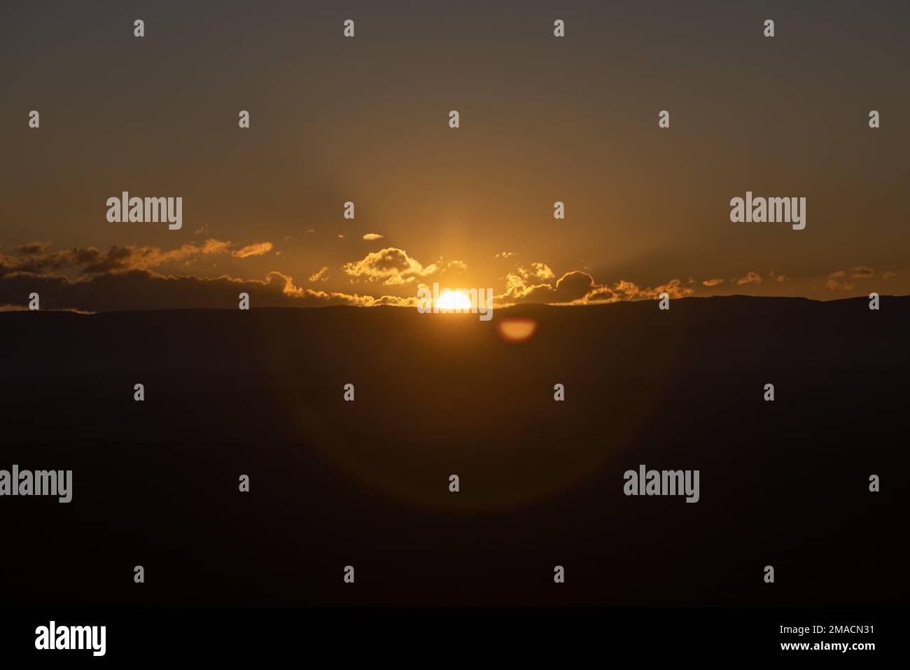 Sunrise aerial sun flare over hi-res stock photography and images - Alamy