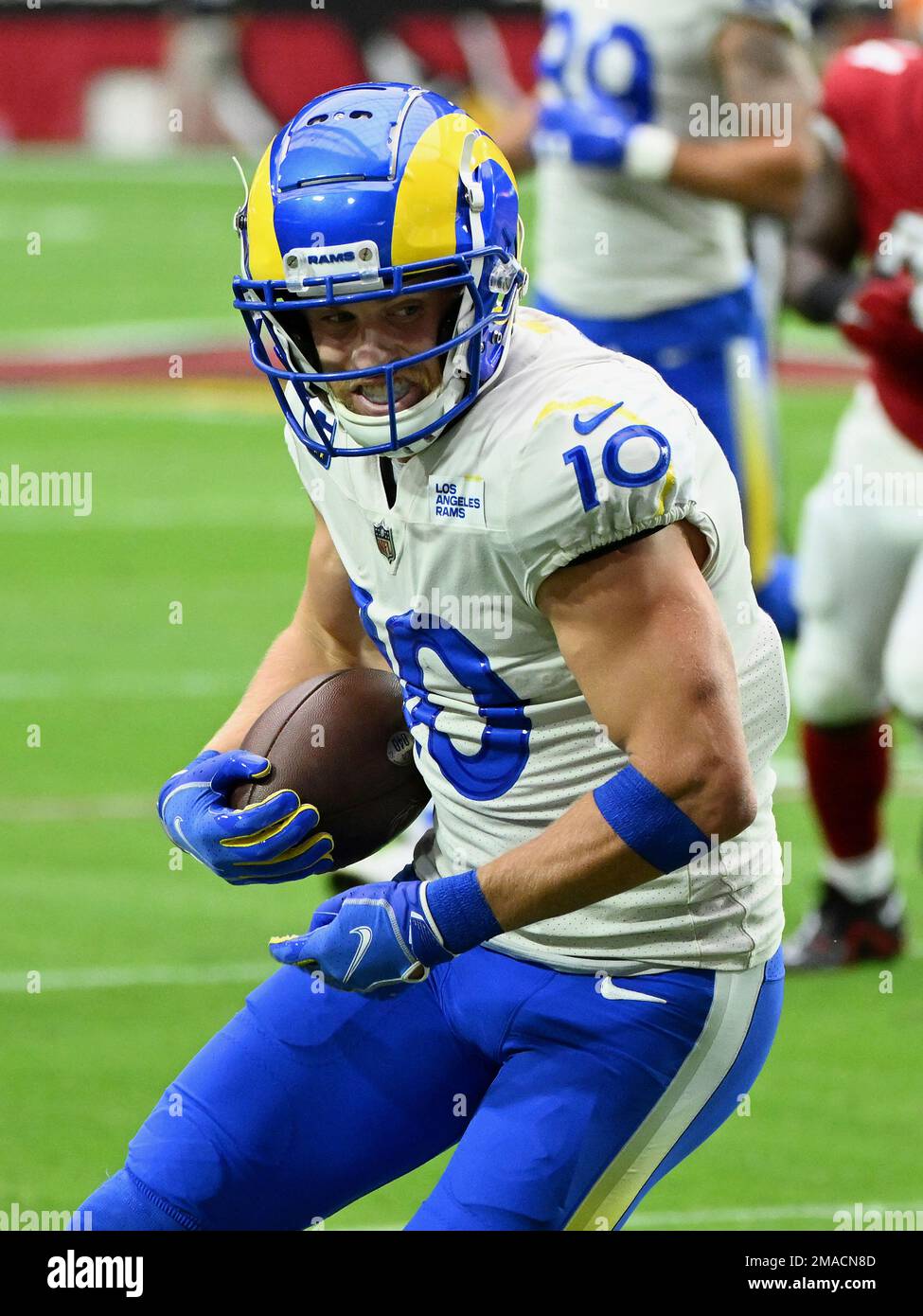 Los Angeles Rams wide receiver Cooper Kupp (10) gains yards after ...