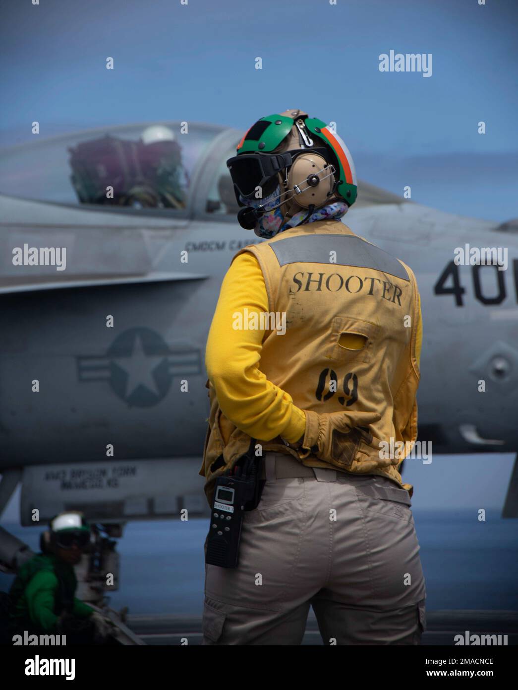 220525-N-YS933-1122 PACIFIC OCEAN (May 25, 2022) A shooter prepares to ...