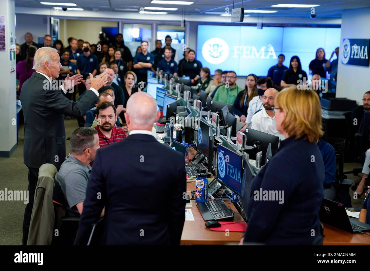 President Joe Biden speaks as he visits FEMA headquarters, Thursday ...