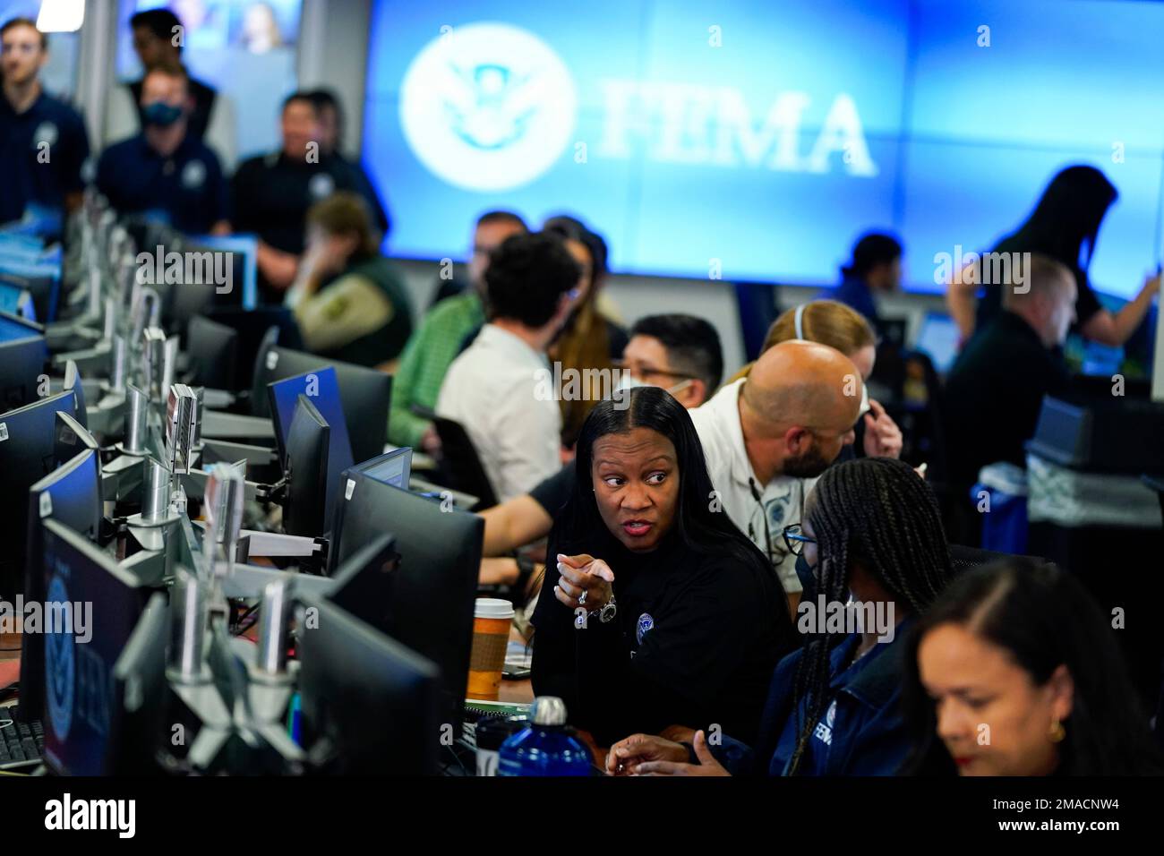 People work at FEMA headquarters, Thursday, Sept. 29, 2022, in ...