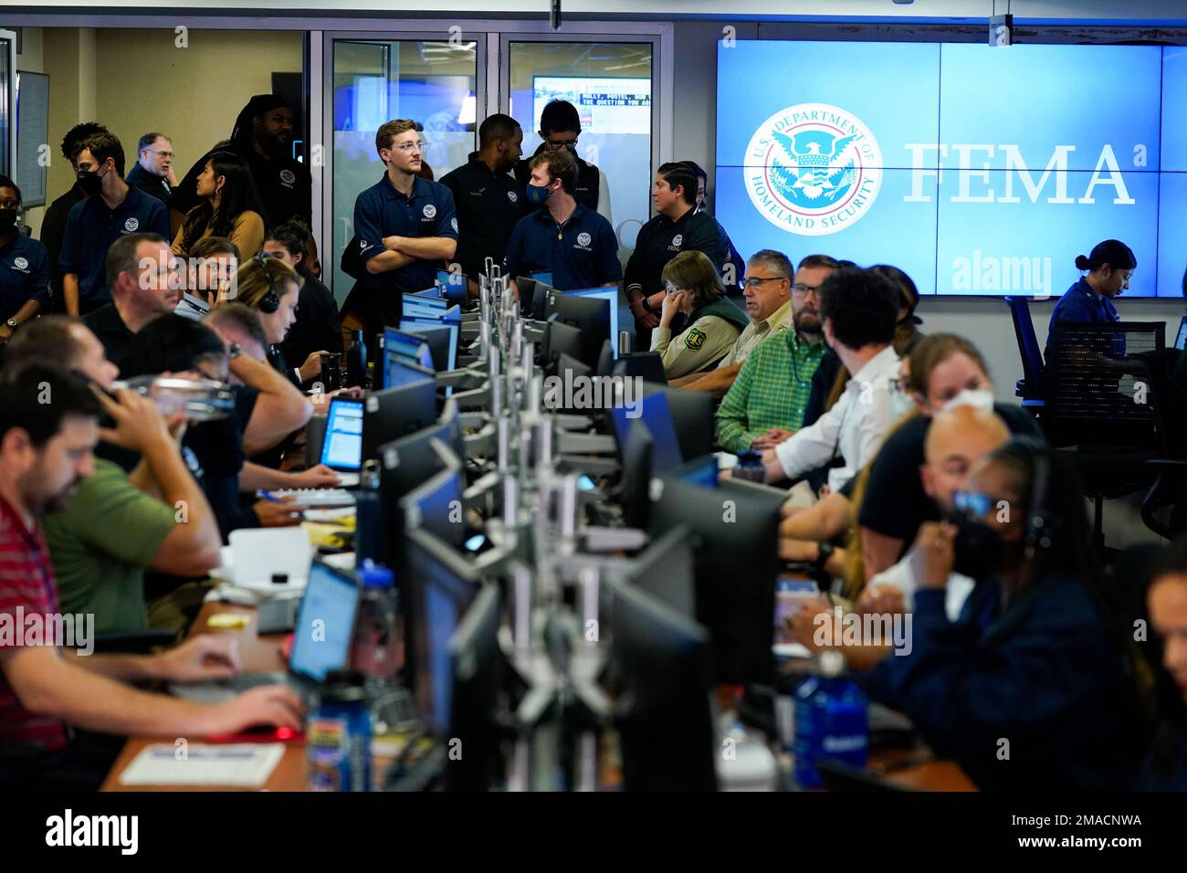 People work at FEMA headquarters, Thursday, Sept. 29, 2022, in ...