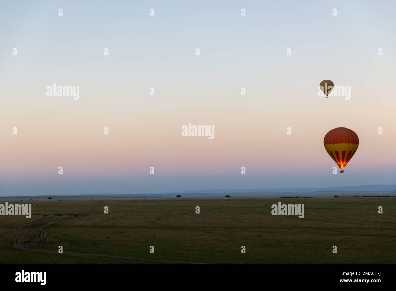 Hot air balloons float over Masai Mara in Kenya Stock Photo - Alamy