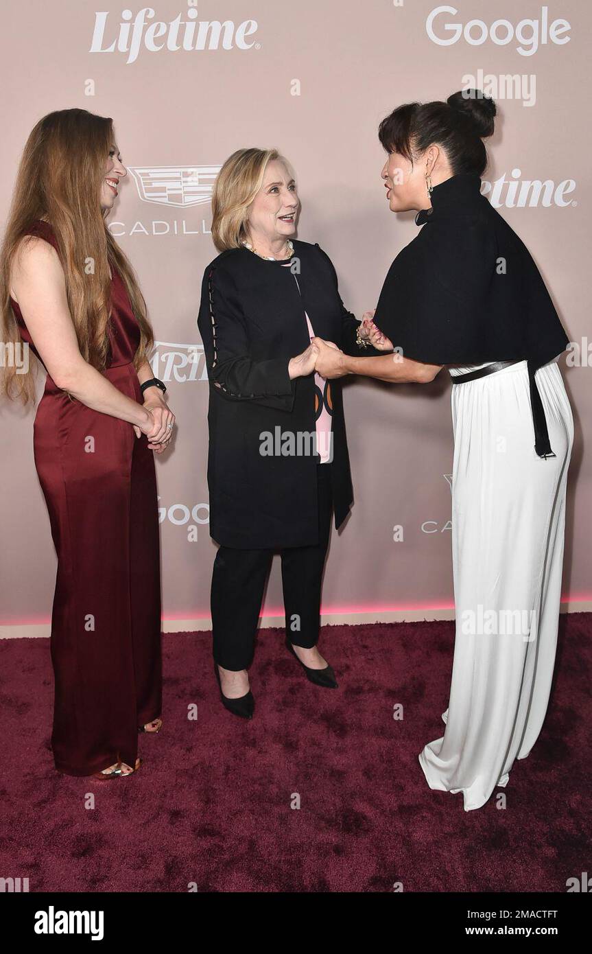Chelsea Clinton, from left, Hillary Clinton and Sandra Oh arrive at ...