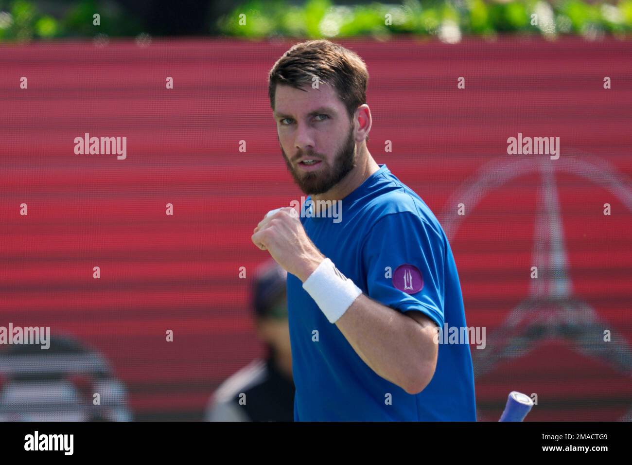Cameron Norrie, of Britain, reacts after winning a point against Kaichi ...