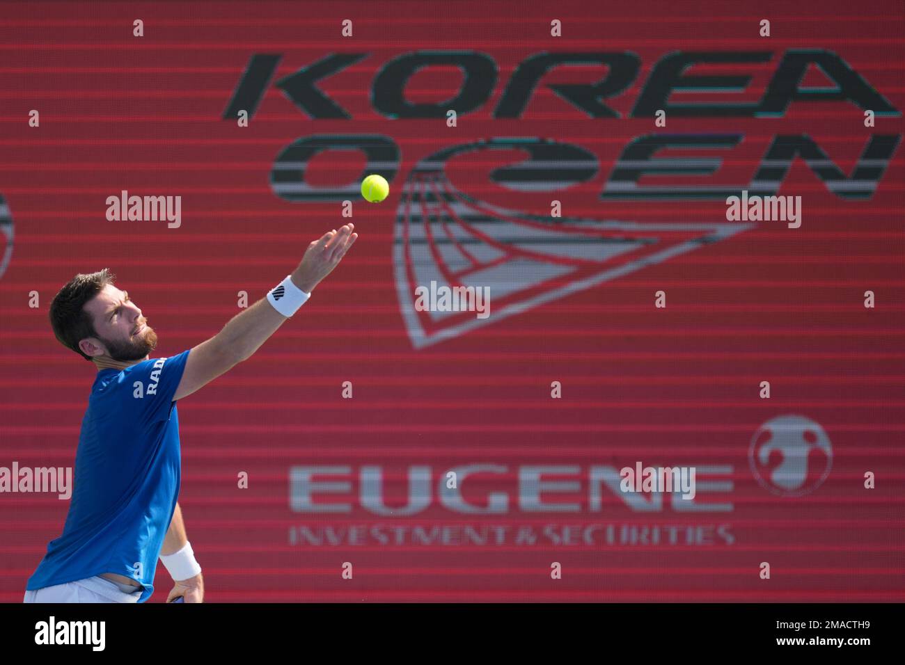 Cameron Norrie, of Britain, serves to Kaichi Uchida of Japan during the ...