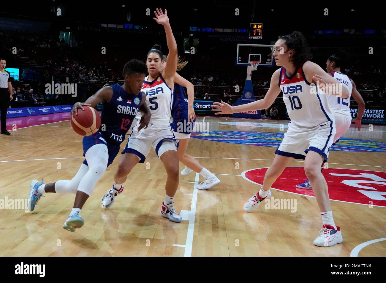 Serbia's Yvonne Anderson runs past United States' Kelsey Plum and ...