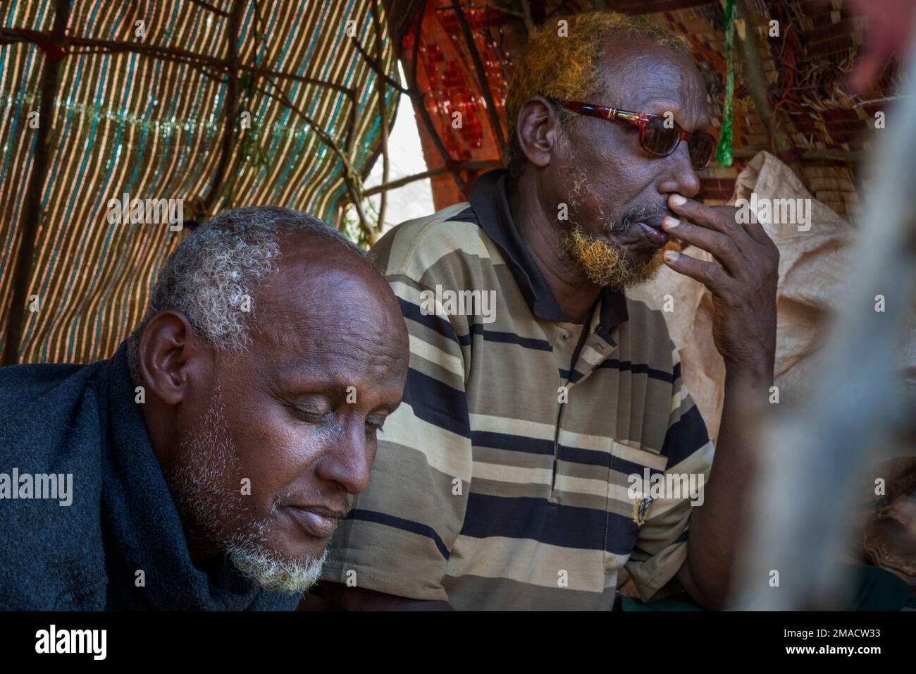 Mohamed Kheir Issack, 80, right, and Issack Farow Hassan, 75, sit in ...