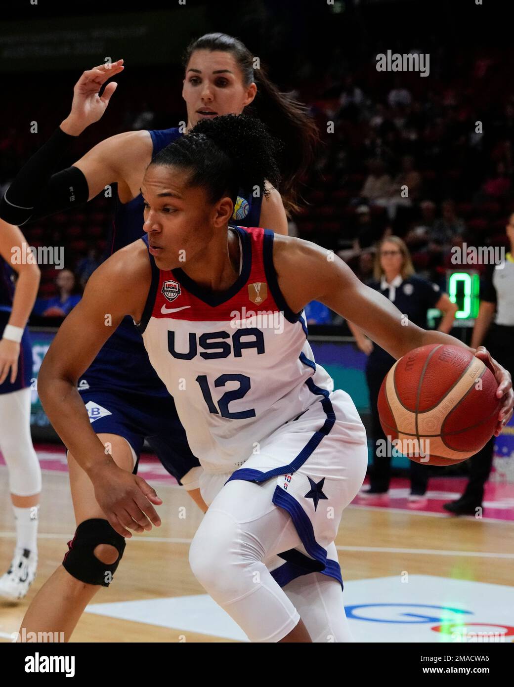 United States' Alyssa Thomas runs past Serbia's Dragana Stankovic ...