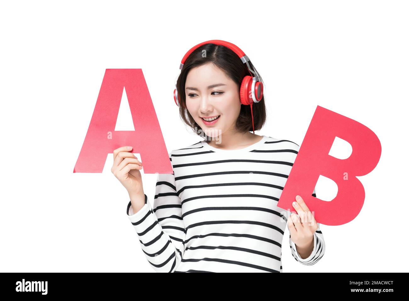 A young woman with English letters Stock Photo - Alamy