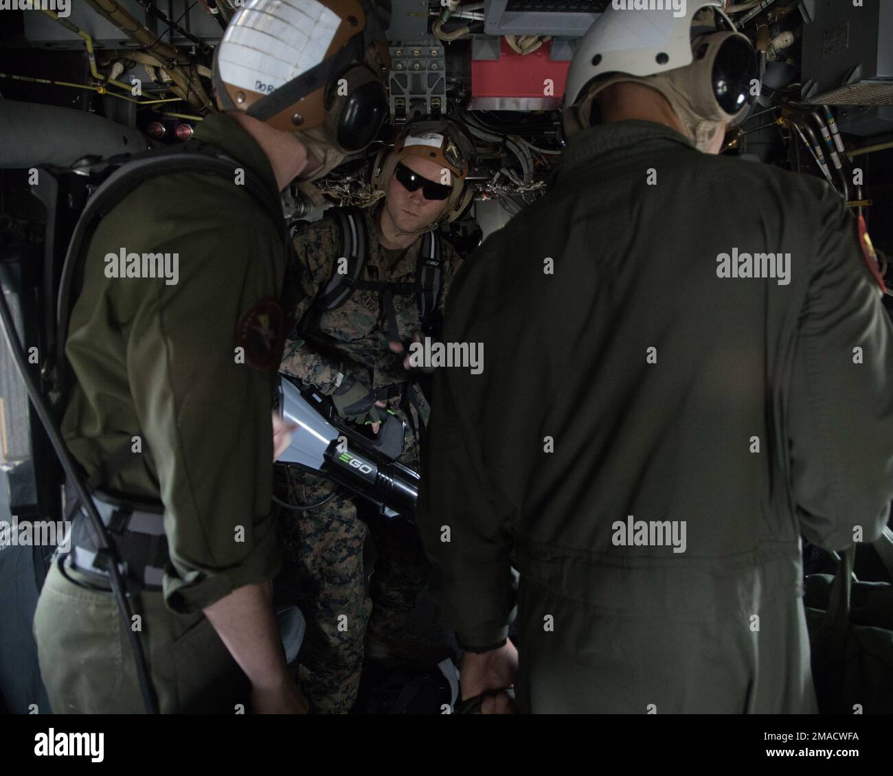 U.S. Marine Corps Cpl. Austin Raver, center, F-35B Lightning II ...