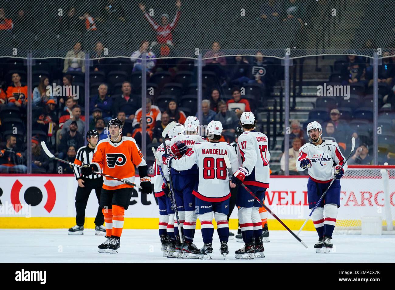 Washington Capitals' Dylan Strome (17) celebrates with teammates after ... Washington Capitals' Dylan Strome (17) celebrates with teammates after ...